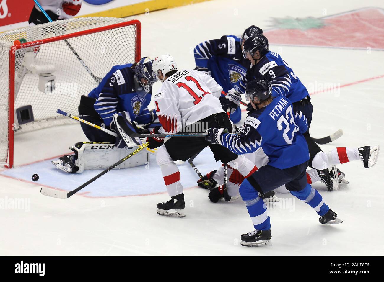 Trinec, Czech Republic. 31st Dec, 2019. (L-R) Justus Annunen of Finland, Jeremi Gerber of ...