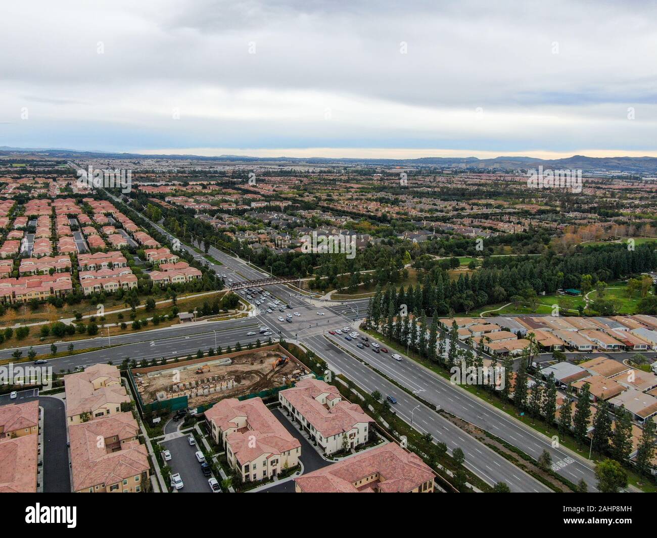 Aerial view of urban sprawl. Suburban packed homes neighborhood with ...