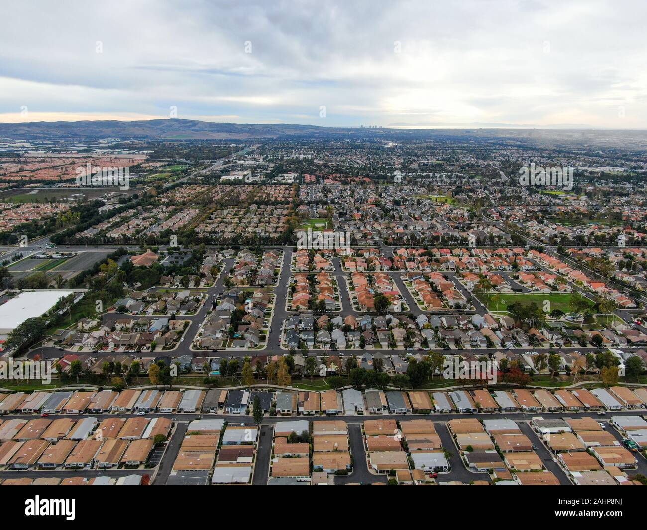 Aerial view of urban sprawl. Suburban packed homes neighborhood with ...