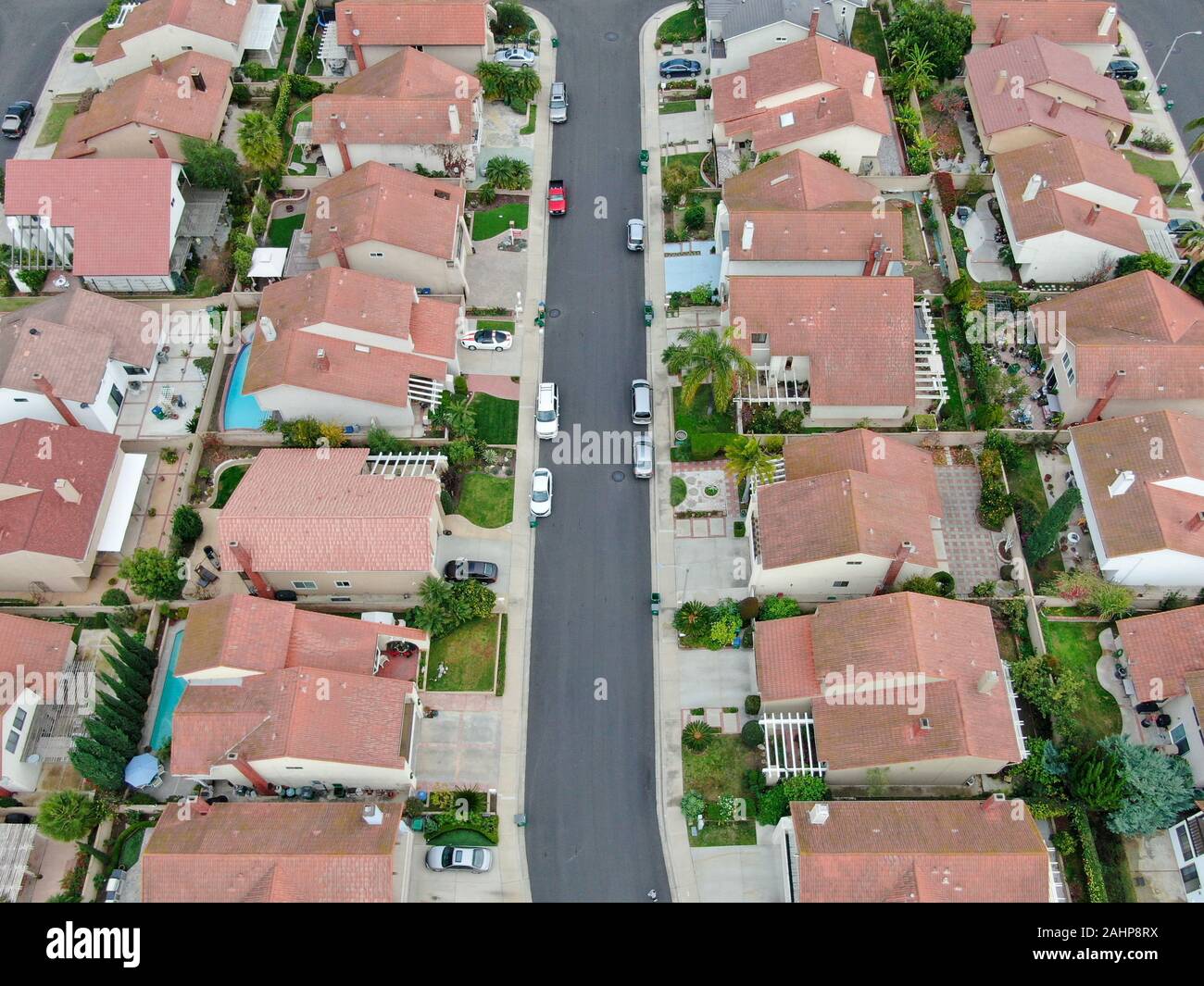 Aerial top view of urban sprawl. Suburban packed homes neighborhood ...