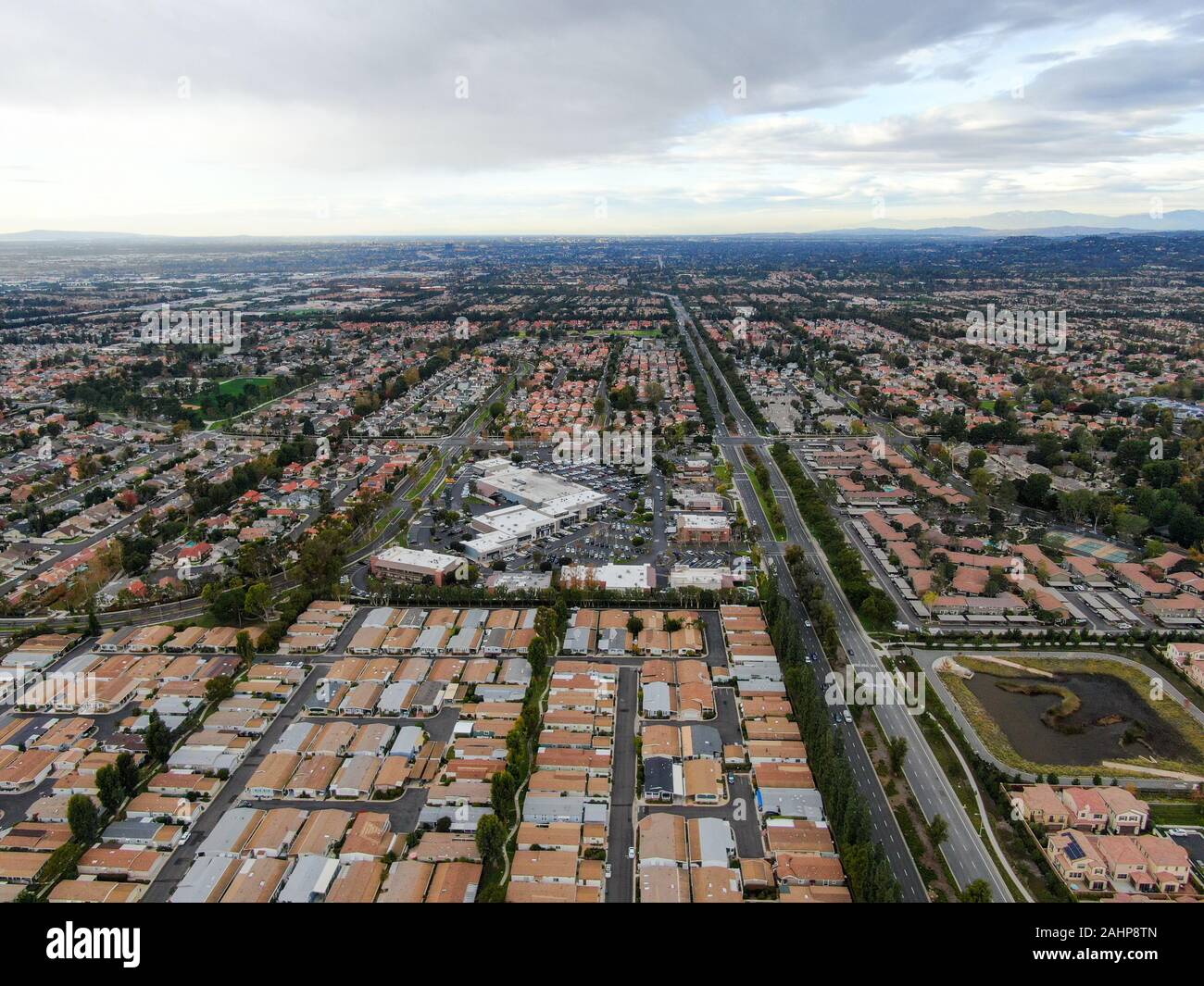 Aerial view of urban sprawl. Suburban packed homes neighborhood with ...
