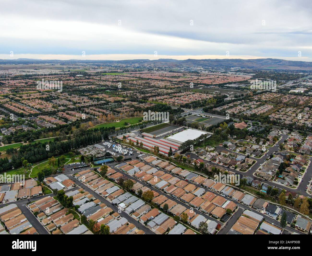 Aerial view of urban sprawl. Suburban packed homes neighborhood with ...