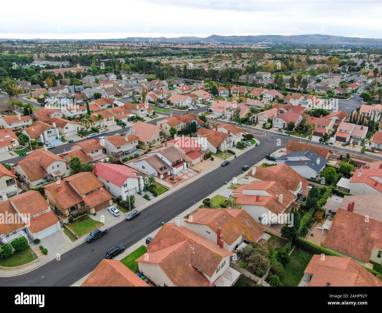Aerial view of urban sprawl. Suburban packed homes neighborhood with ...