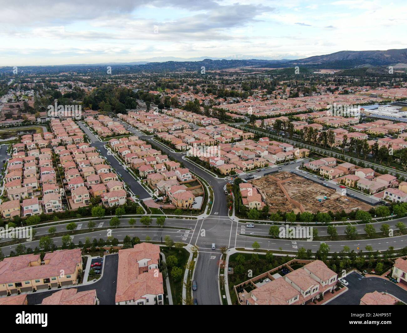 Aerial view of urban sprawl. Suburban packed homes neighborhood with ...