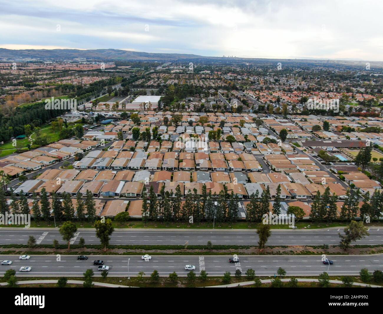 Aerial view of urban sprawl. Suburban packed homes neighborhood with ...