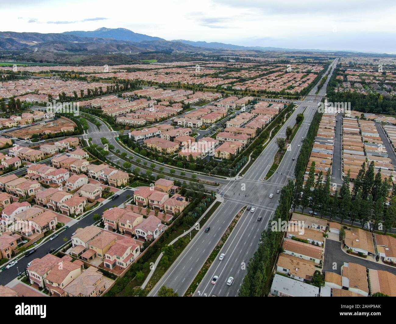 Aerial view of urban sprawl. Suburban packed homes neighborhood with ...
