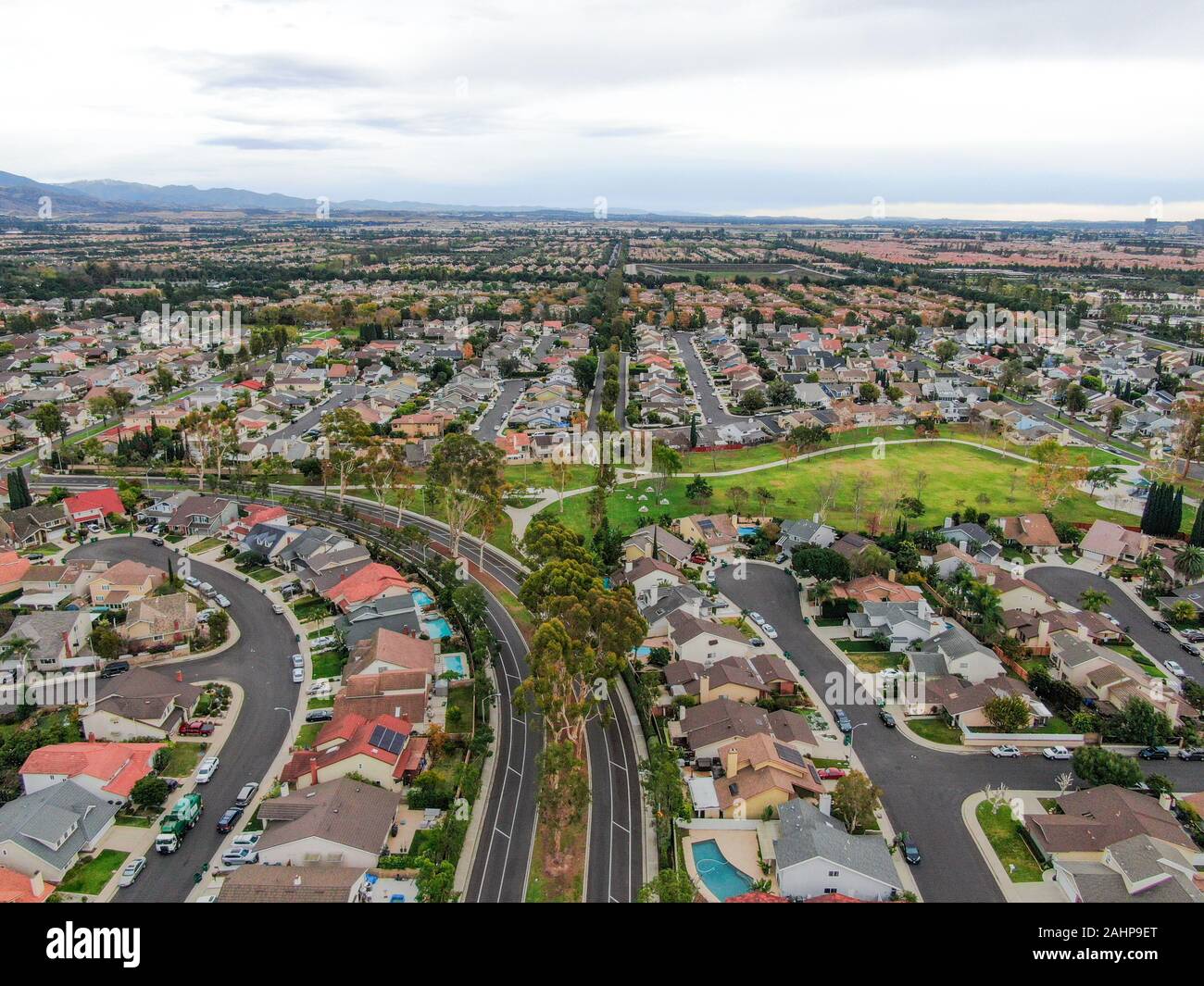Aerial view of urban sprawl. Suburban packed homes neighborhood with ...