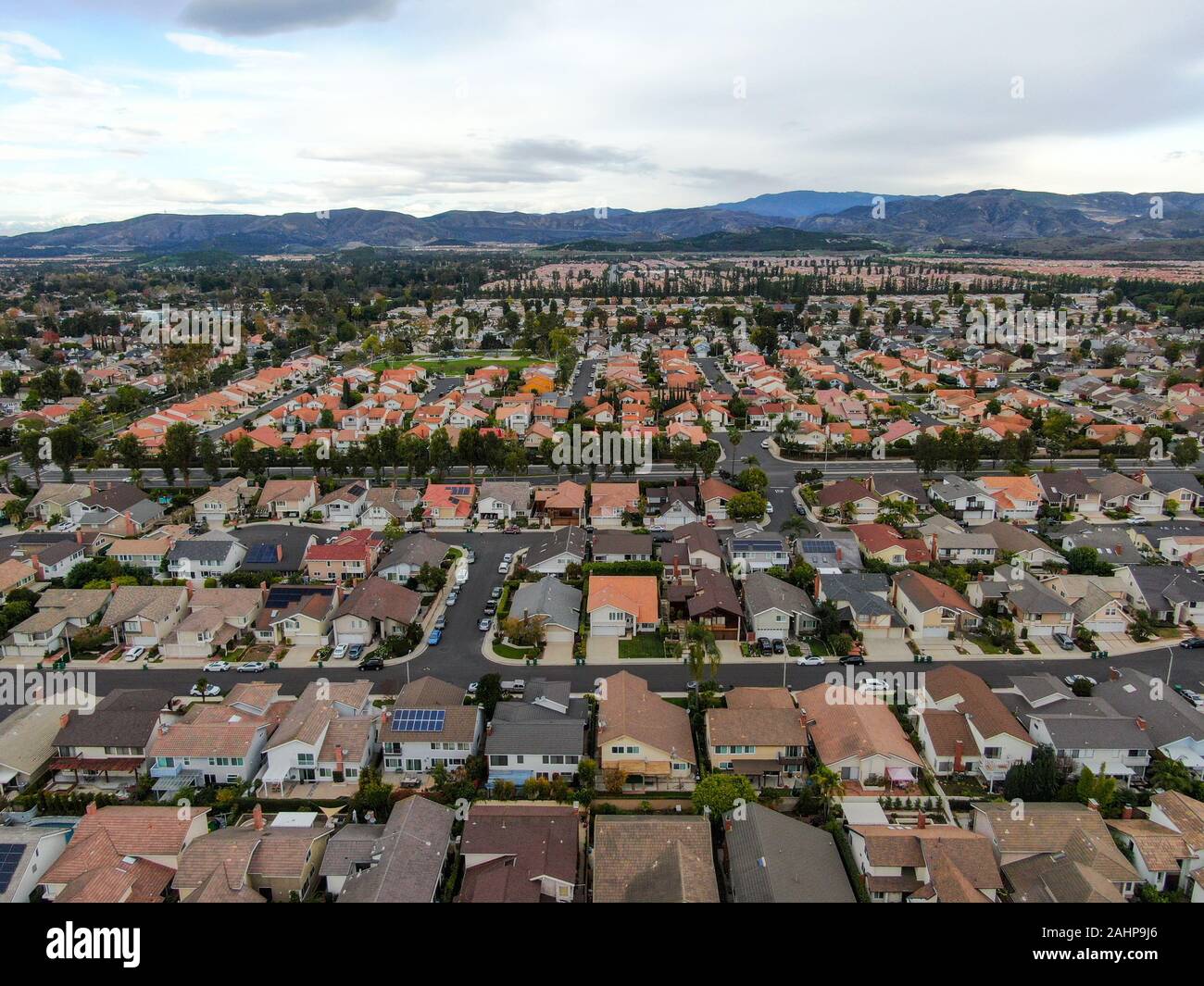 Aerial view of urban sprawl. Suburban packed homes neighborhood with ...