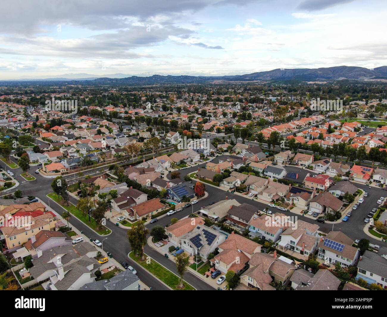 Aerial view of urban sprawl. Suburban packed homes neighborhood with ...
