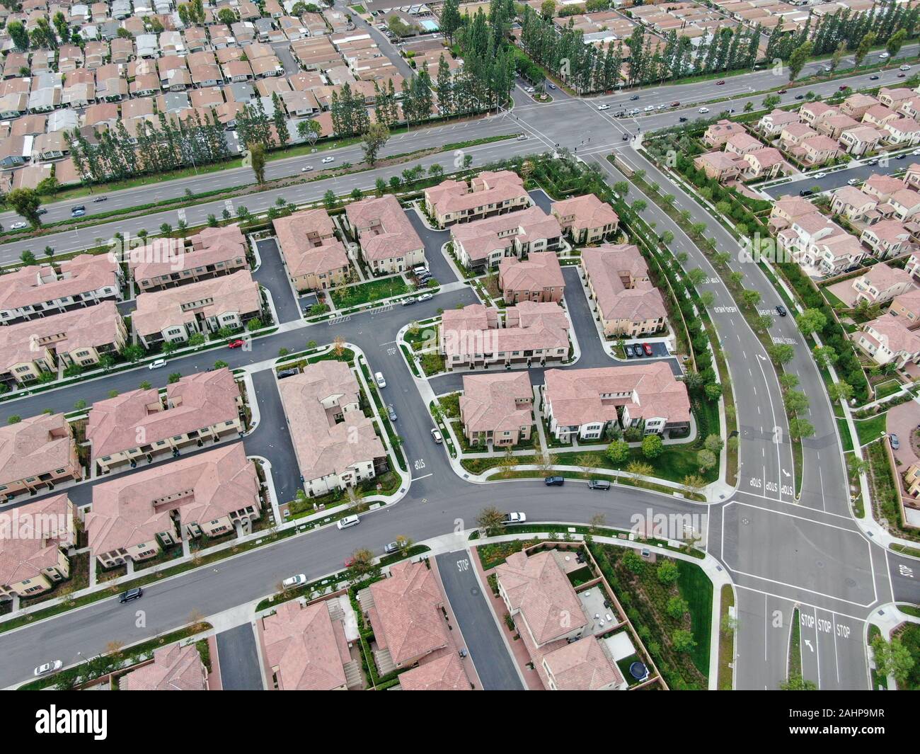 Aerial view of urban sprawl. Suburban packed homes neighborhood with ...