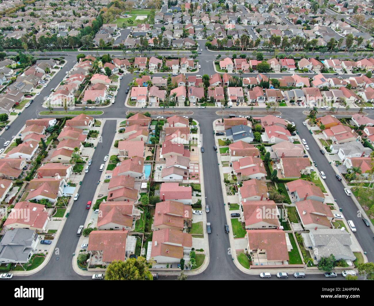 Aerial view of urban sprawl. Suburban packed homes neighborhood with ...