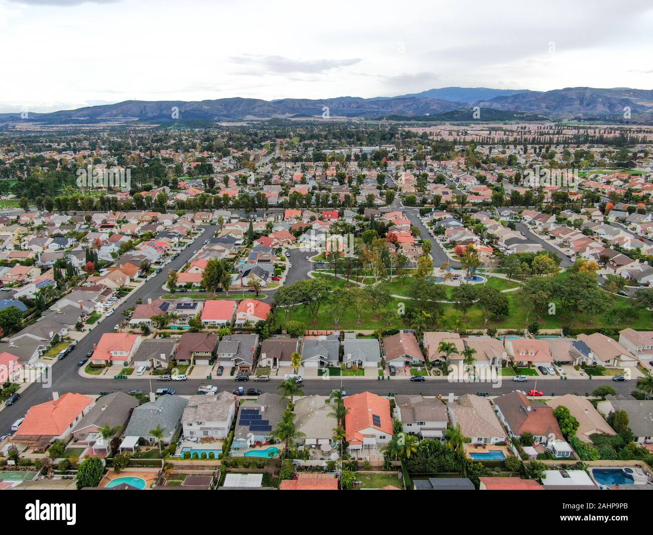 Aerial view of urban sprawl. Suburban packed homes neighborhood with ...