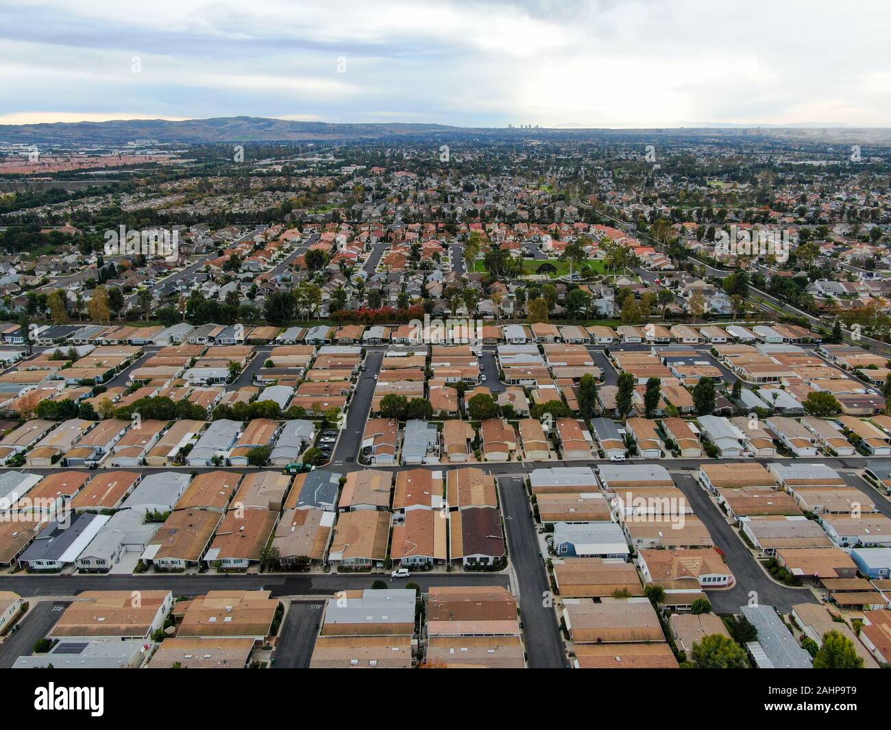 Aerial view of urban sprawl. Suburban packed homes neighborhood with ...