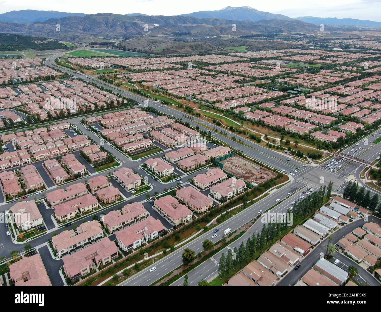 Aerial view of urban sprawl. Suburban packed homes neighborhood with ...