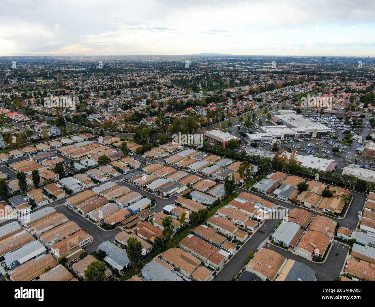 Aerial view of urban sprawl. Suburban packed homes neighborhood with ...