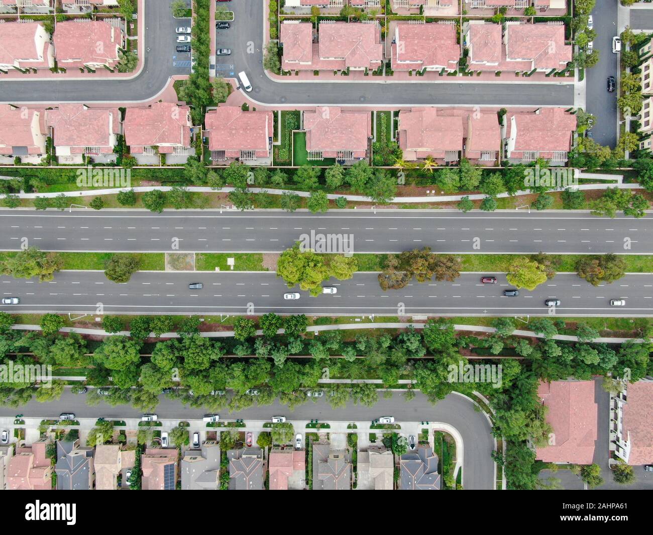 Aerial top view of urban sprawl. Suburban packed homes neighborhood ...