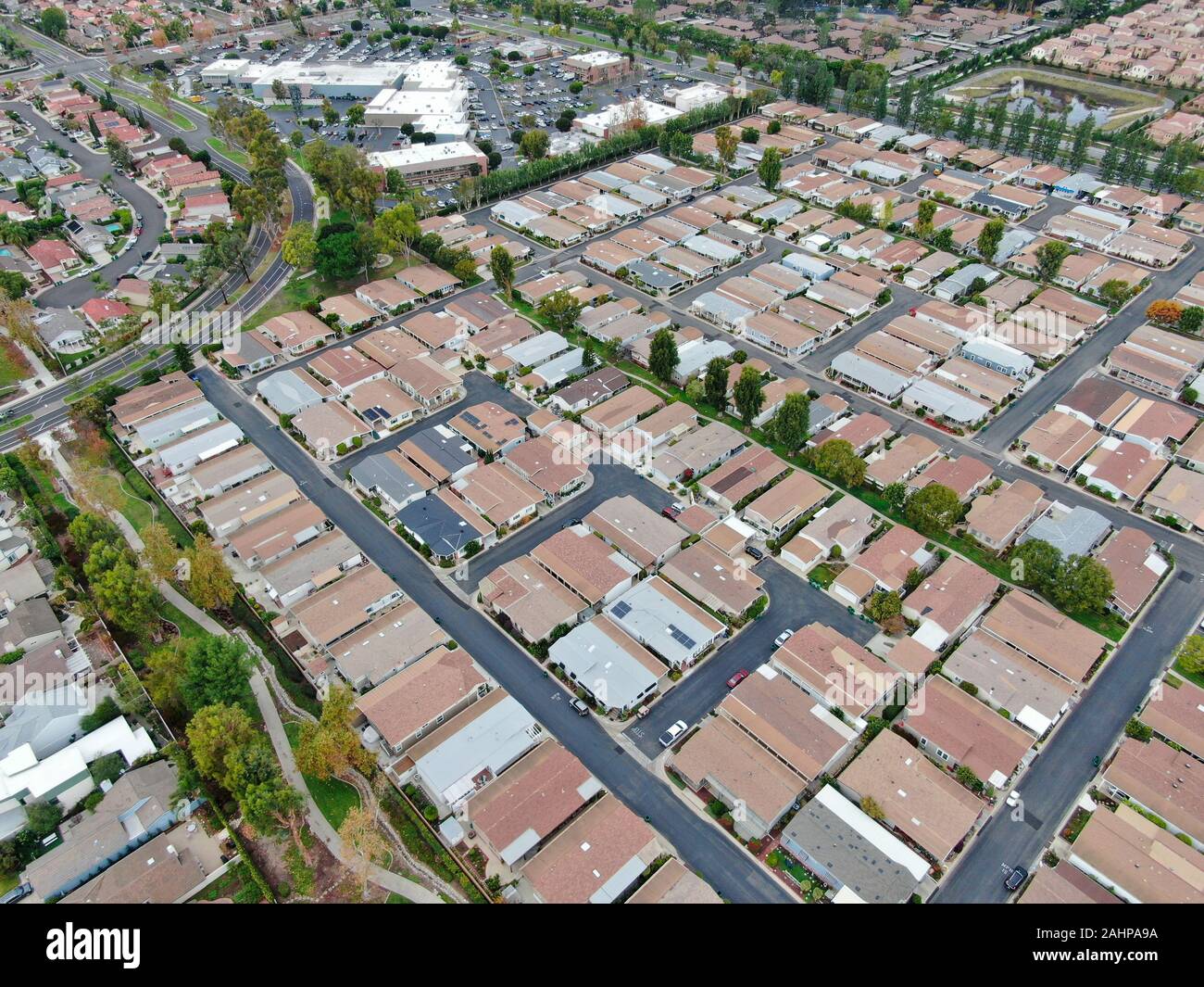 Aerial view of urban sprawl. Suburban packed homes neighborhood with ...