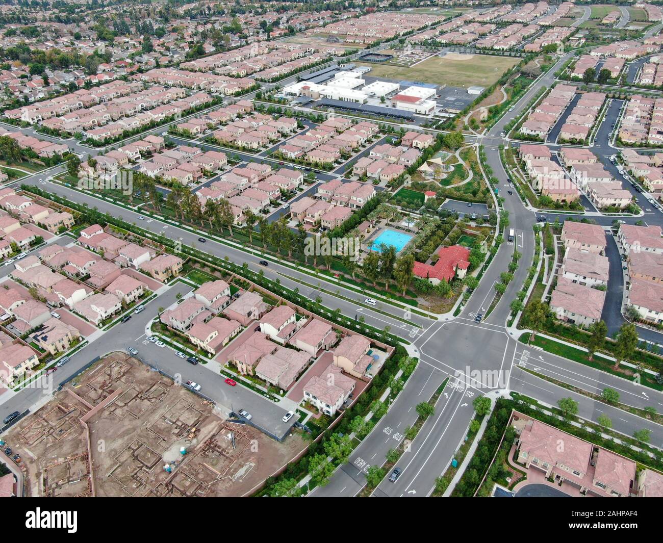 Aerial view of urban sprawl. Suburban packed homes neighborhood with ...