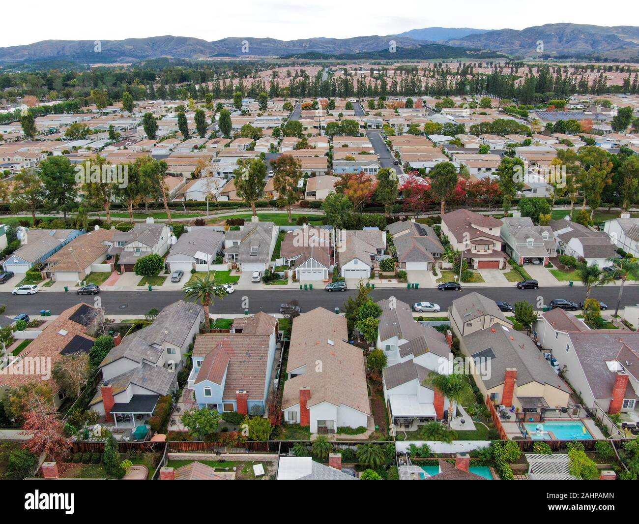 Aerial view of urban sprawl. Suburban packed homes neighborhood with ...