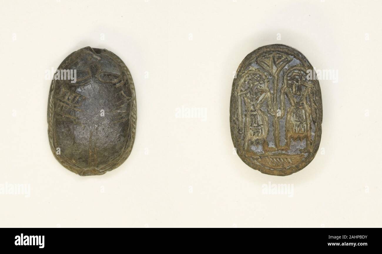 Ancient Egyptian. Scaraboid Face Motif on Top; Two Figures Holding ...