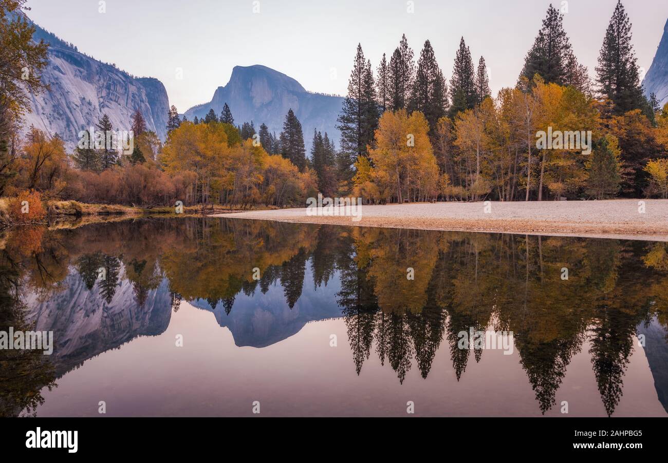 Half Dome reflection on the Merced River on a clam fall morning Stock ...