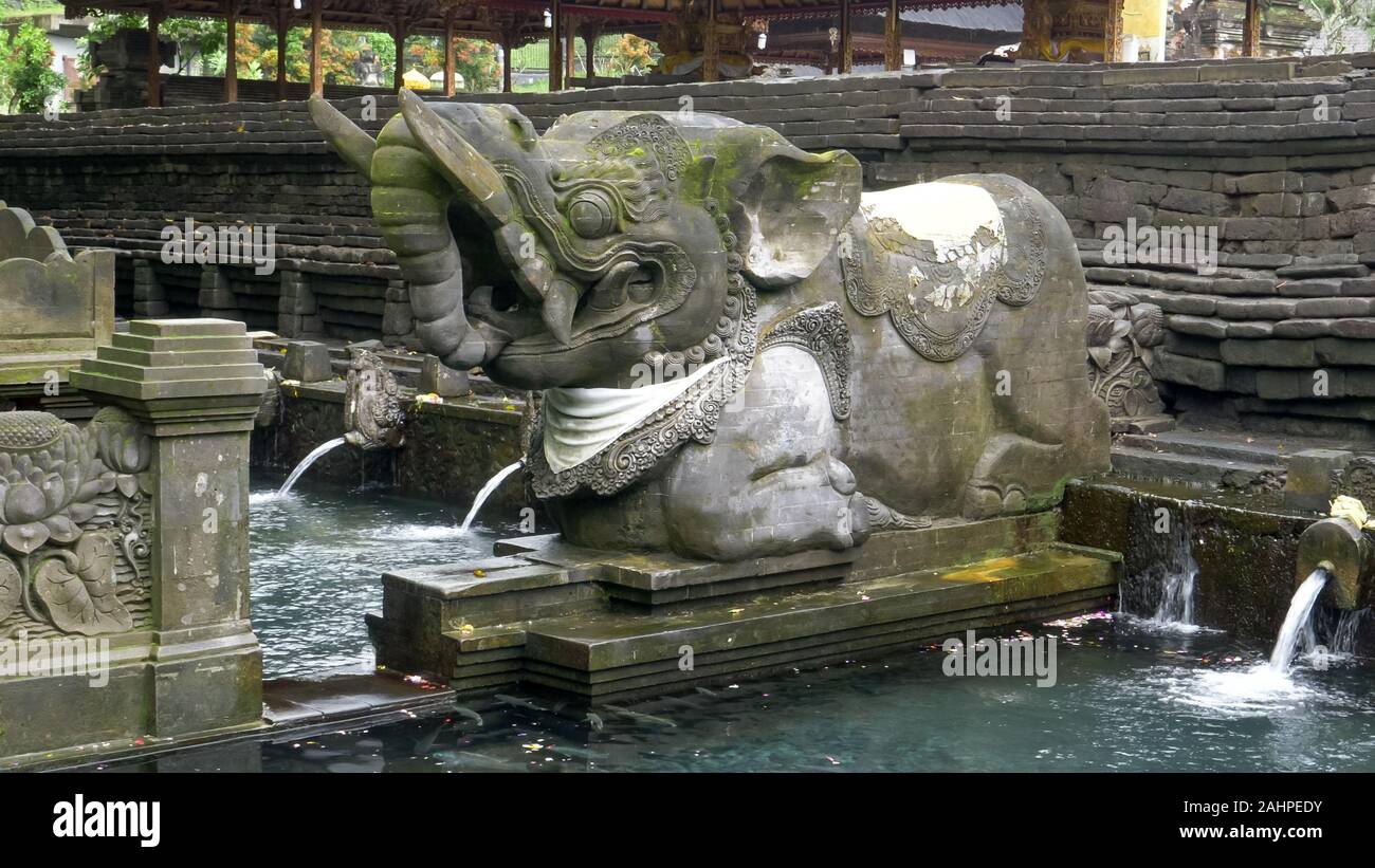 elephant statue at holy spring fountain in bali Stock Photo - Alamy