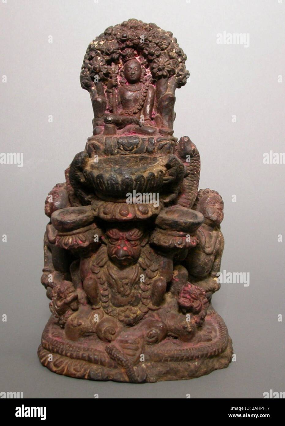 Lamp with Deified Figure Upheld by Garuda. 1401–1500. Nepal. Terracotta ...