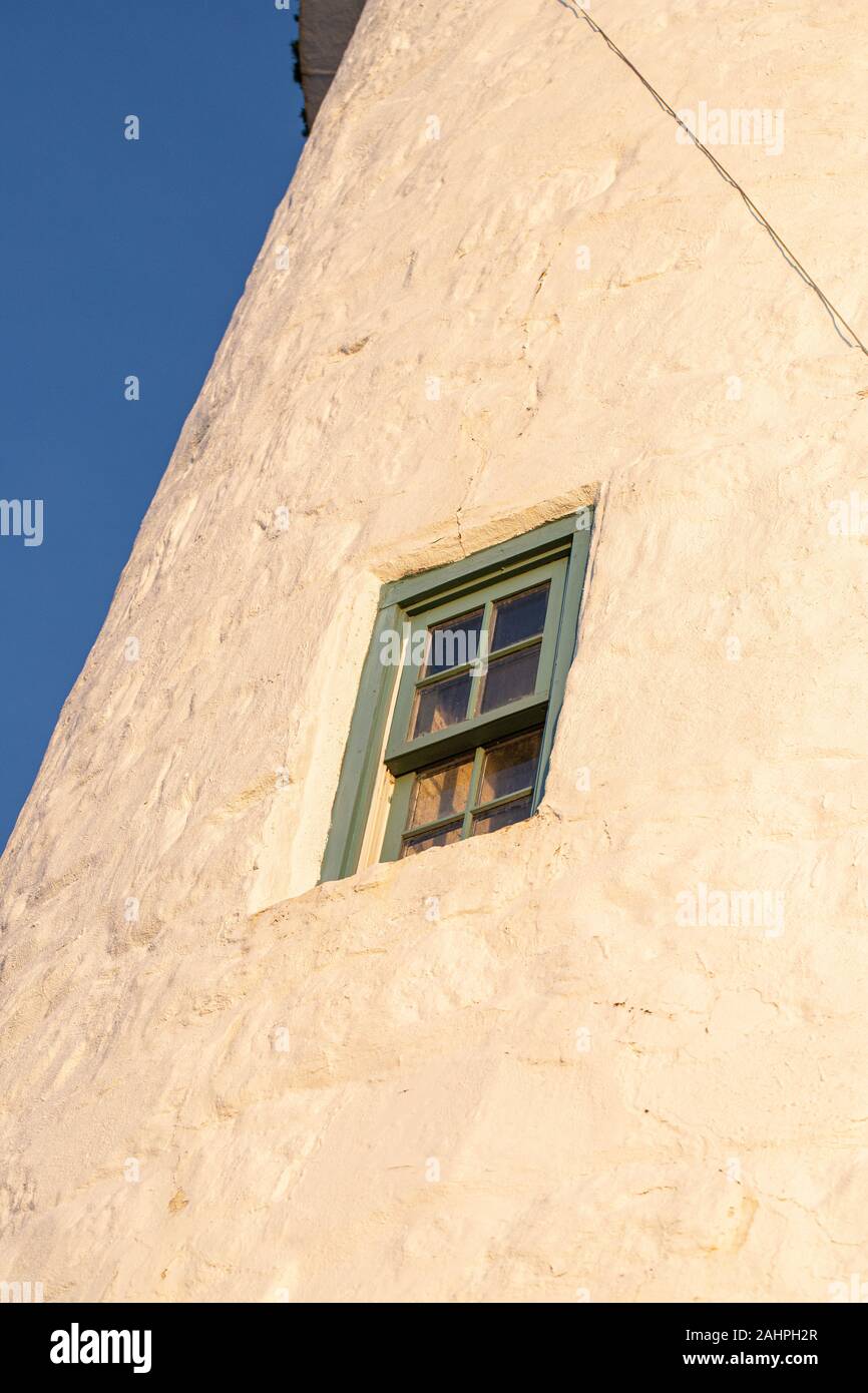 Close up window of a lighthouse at sunrise Stock Photo - Alamy