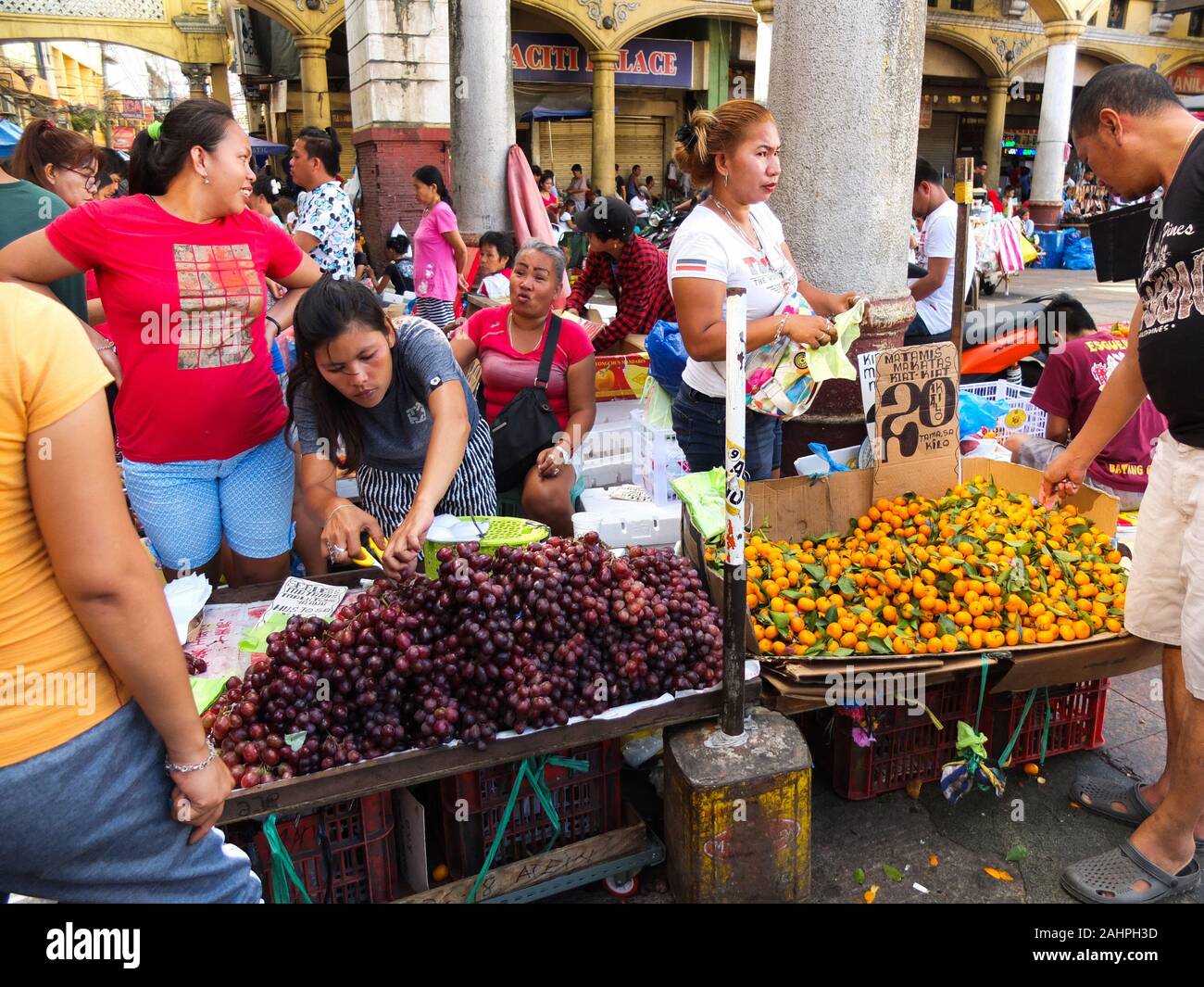 Filipinos with round fruit hi-res stock photography and images - Alamy