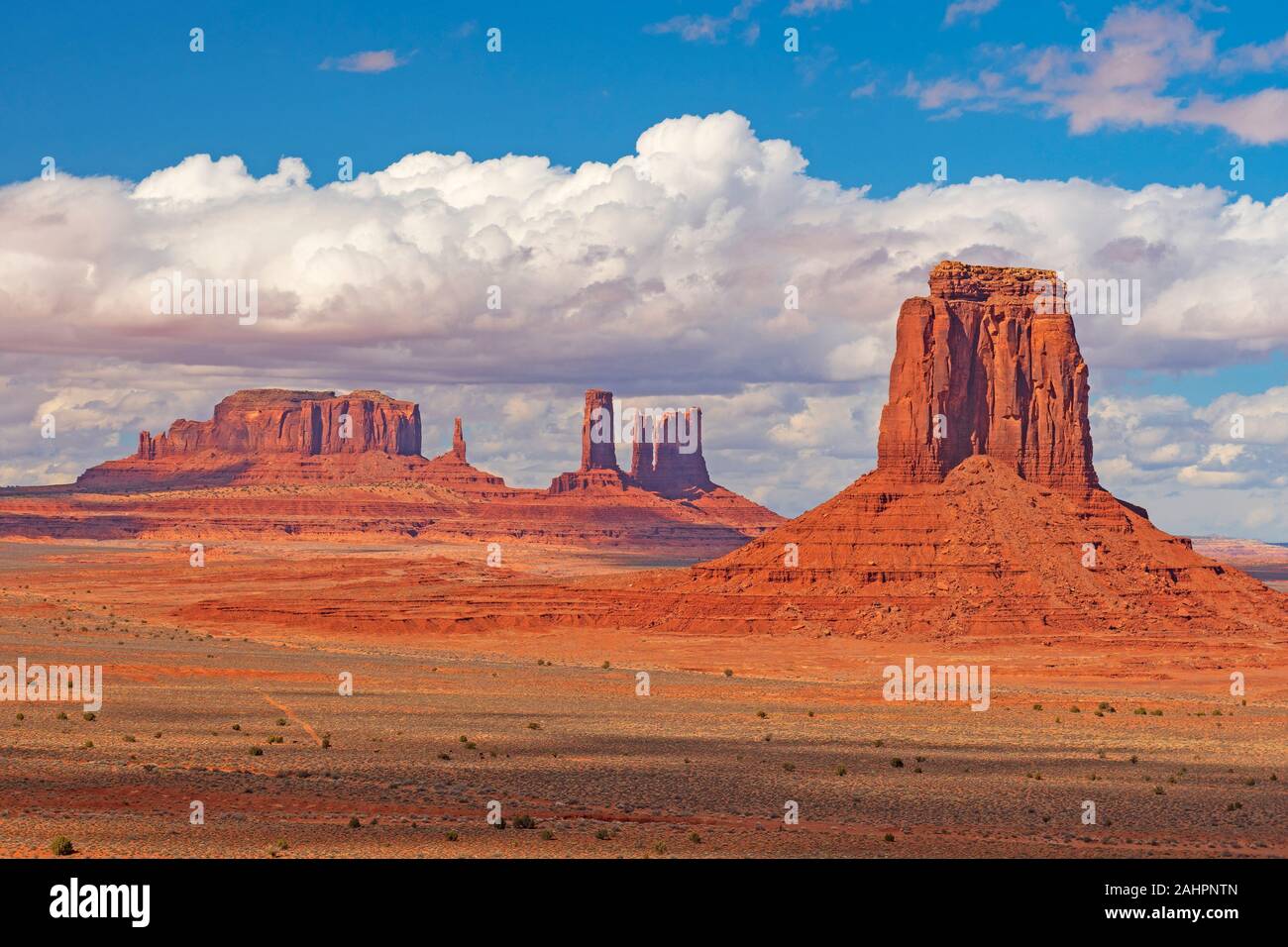 Clouds and Sun Over Desert Buttes in Monument Valley in Arizona Stock ...