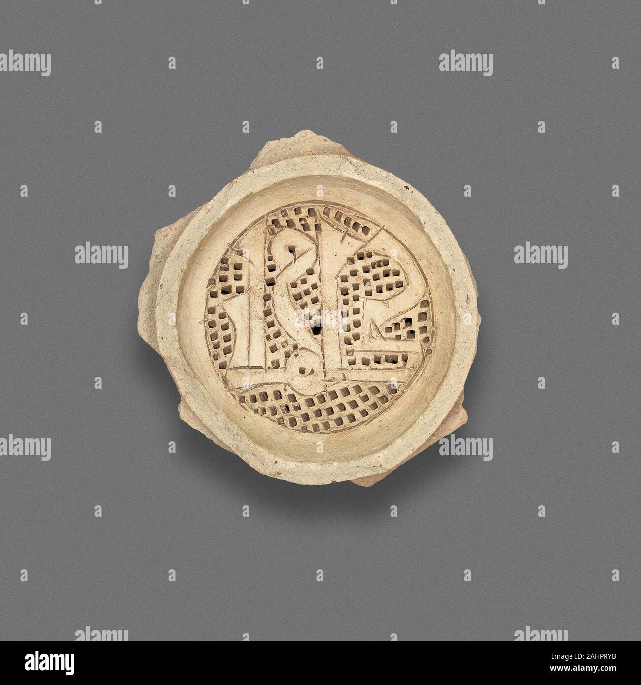 Islamic. Clay filter with callegraphic design. 1000–1200. Masr al ...