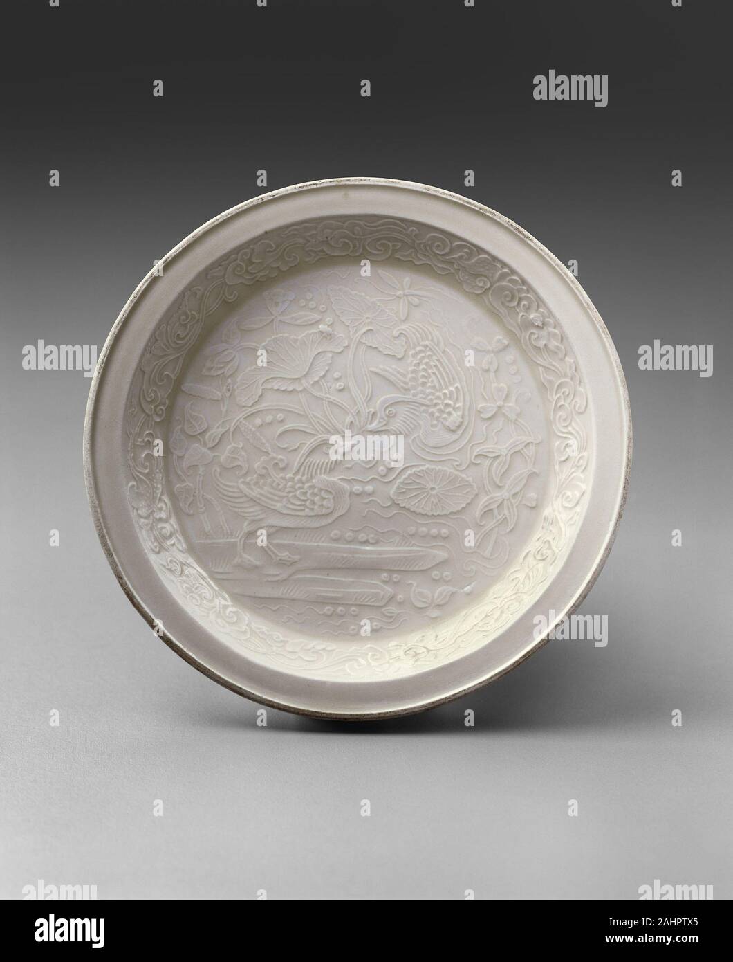 Dish with Mandarin Ducks in a Lotus Pond. 1115–1199. China. Ding ware ...