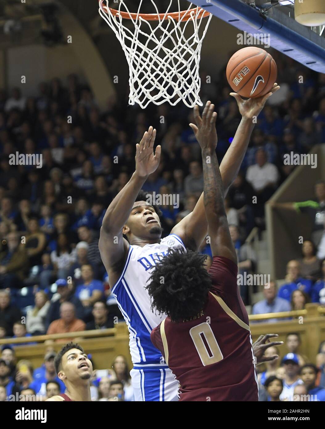 Durham, North Carolina, USA. 31st Dec, 2019. VERNON CAREY JR., left, of ...