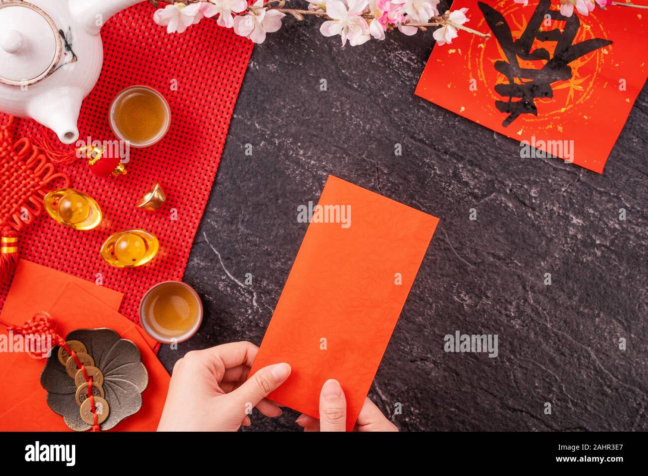 Chinese woman giving money chinese hi-res stock photography and images ...