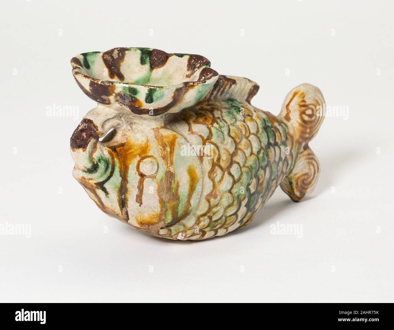 Fish-Shaped Oil Lamp. 700 AD–750 AD. China. Slip-coated earthenware ...