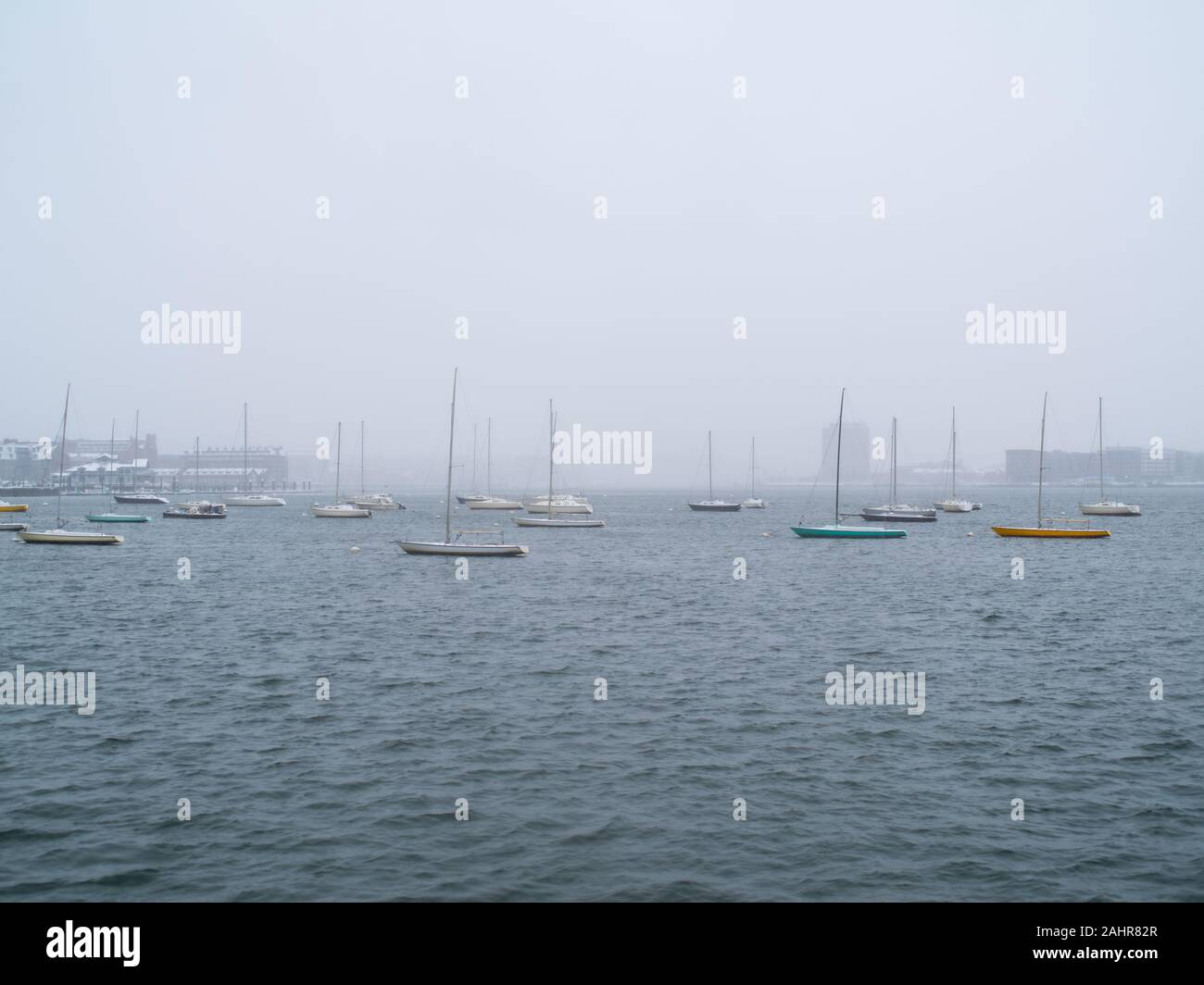 Sailboats in a Winter Storm in Boston Harbor Stock Photo - Alamy
