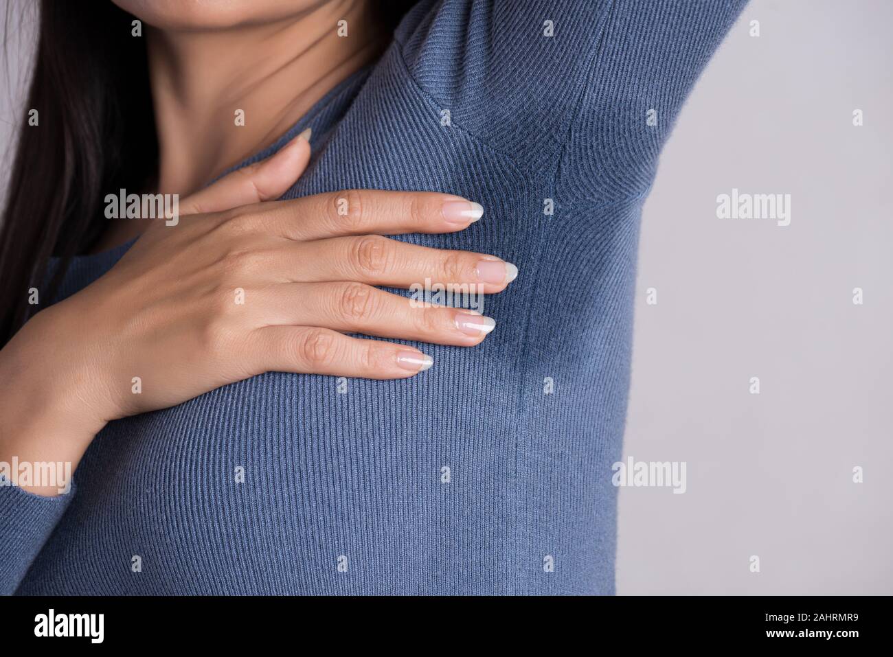 Close-up asian woman with hyperhidrosis sweating. Young asia woman with ...
