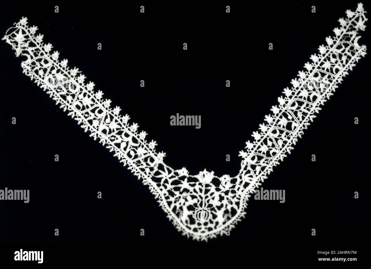 Linen needle lace worked on a laid and plaited grid hi-res stock ...