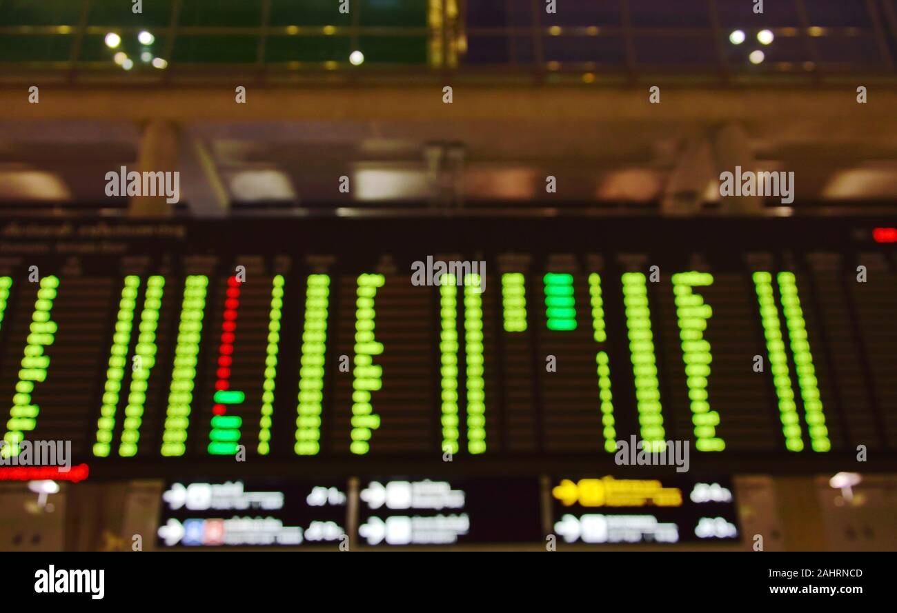 blurry of big timetable in airport terminal building Stock Photo - Alamy