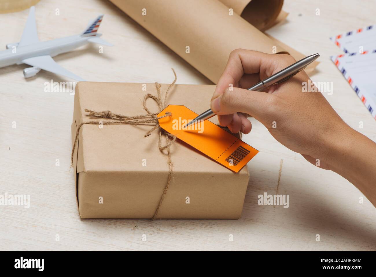 Brown paper parcel post label tied hi-res stock photography and images ...