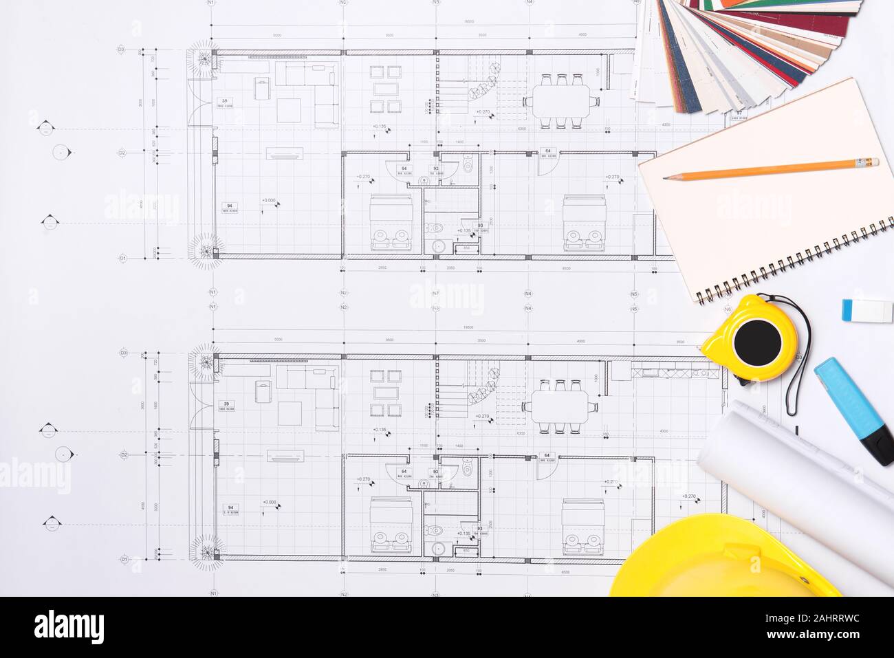Construction plans with helmet and drawing tools on blueprints Stock ...