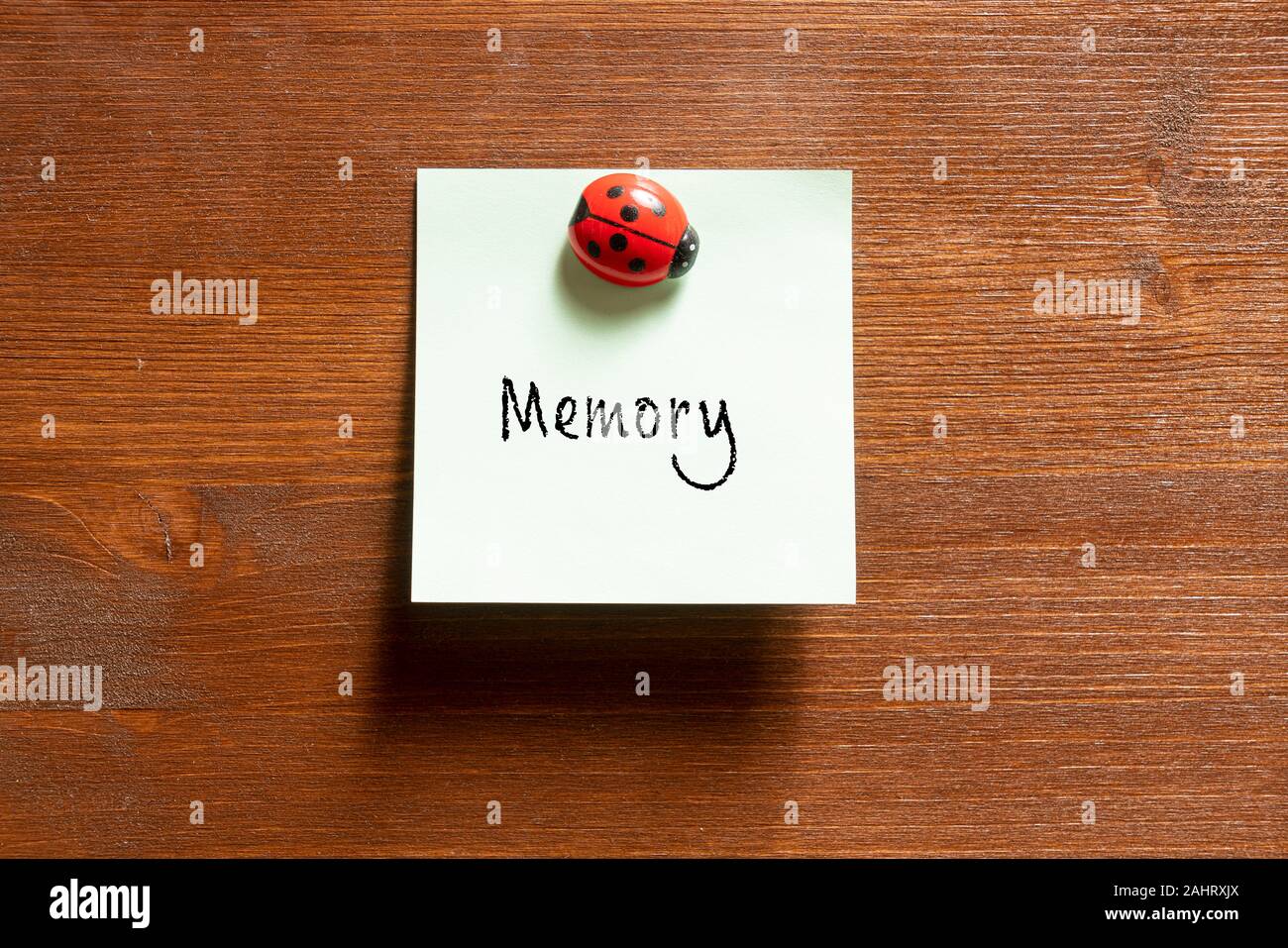 a colored memo sheet with writing memory Stock Photo - Alamy
