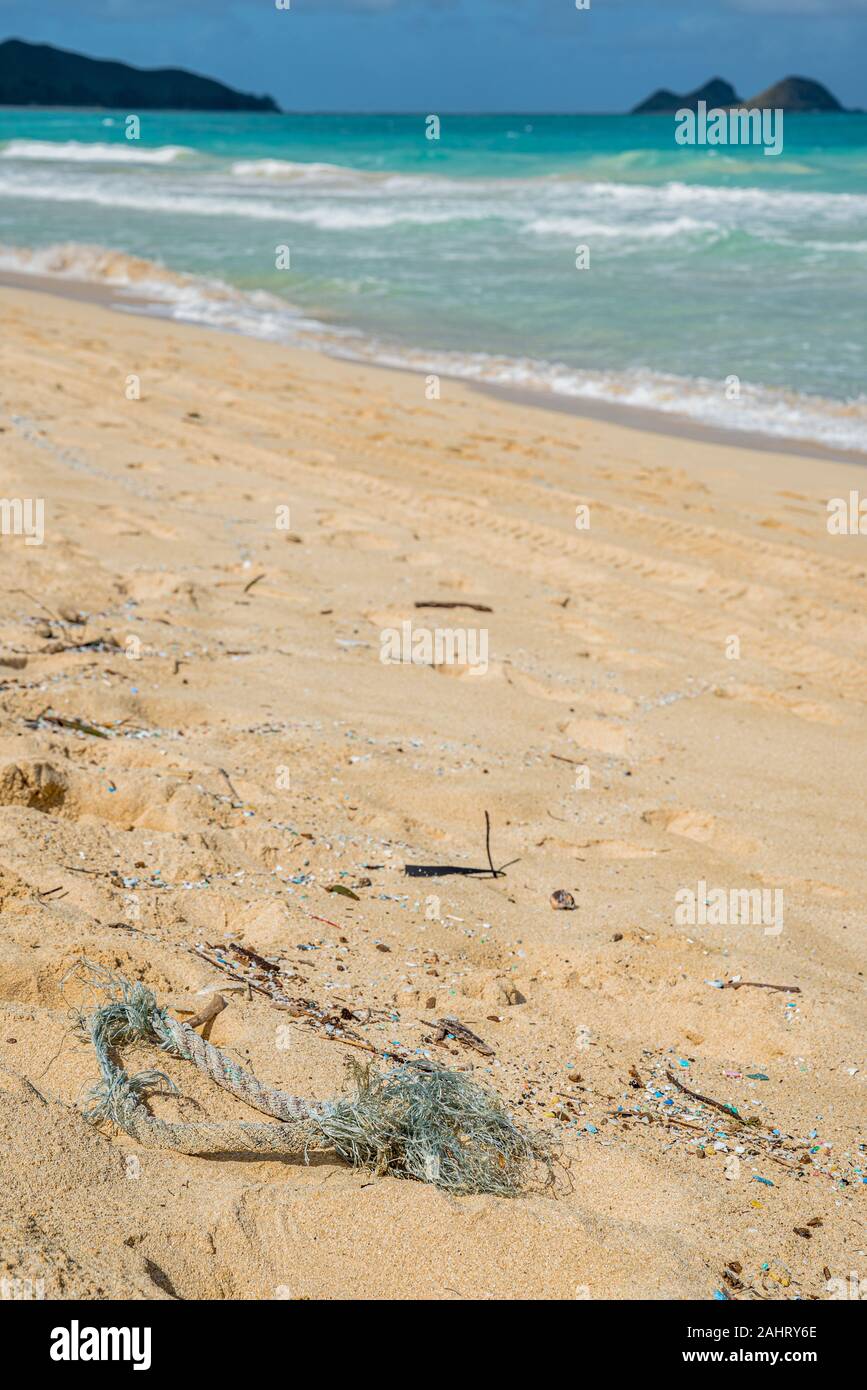 Rope and microplastic pollution littering Waimanalo Beach in Hawaii ...