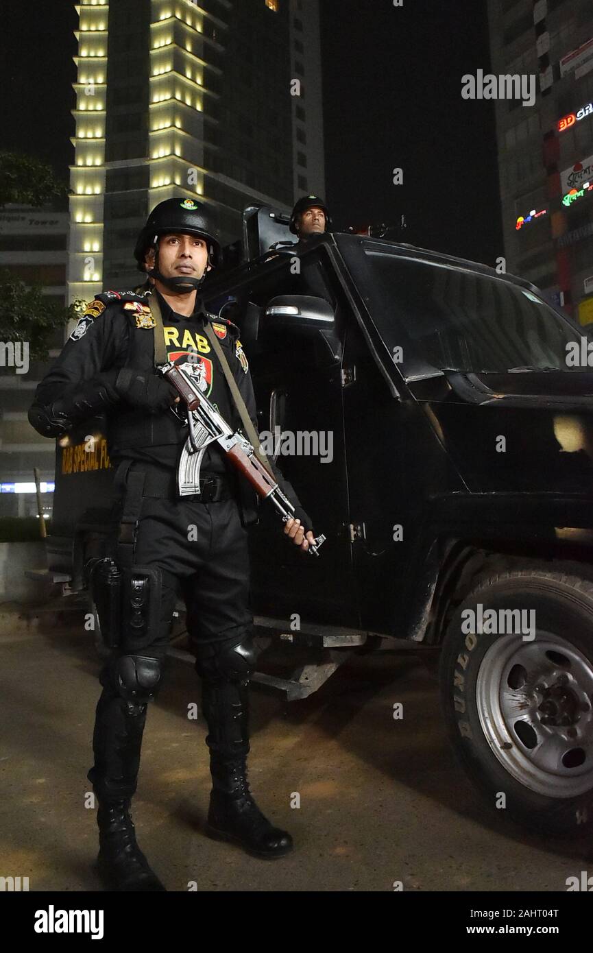 Dhaka, Bangladesh. 1st Jan, 2020. A member of Bangladesh's anti-crime ...