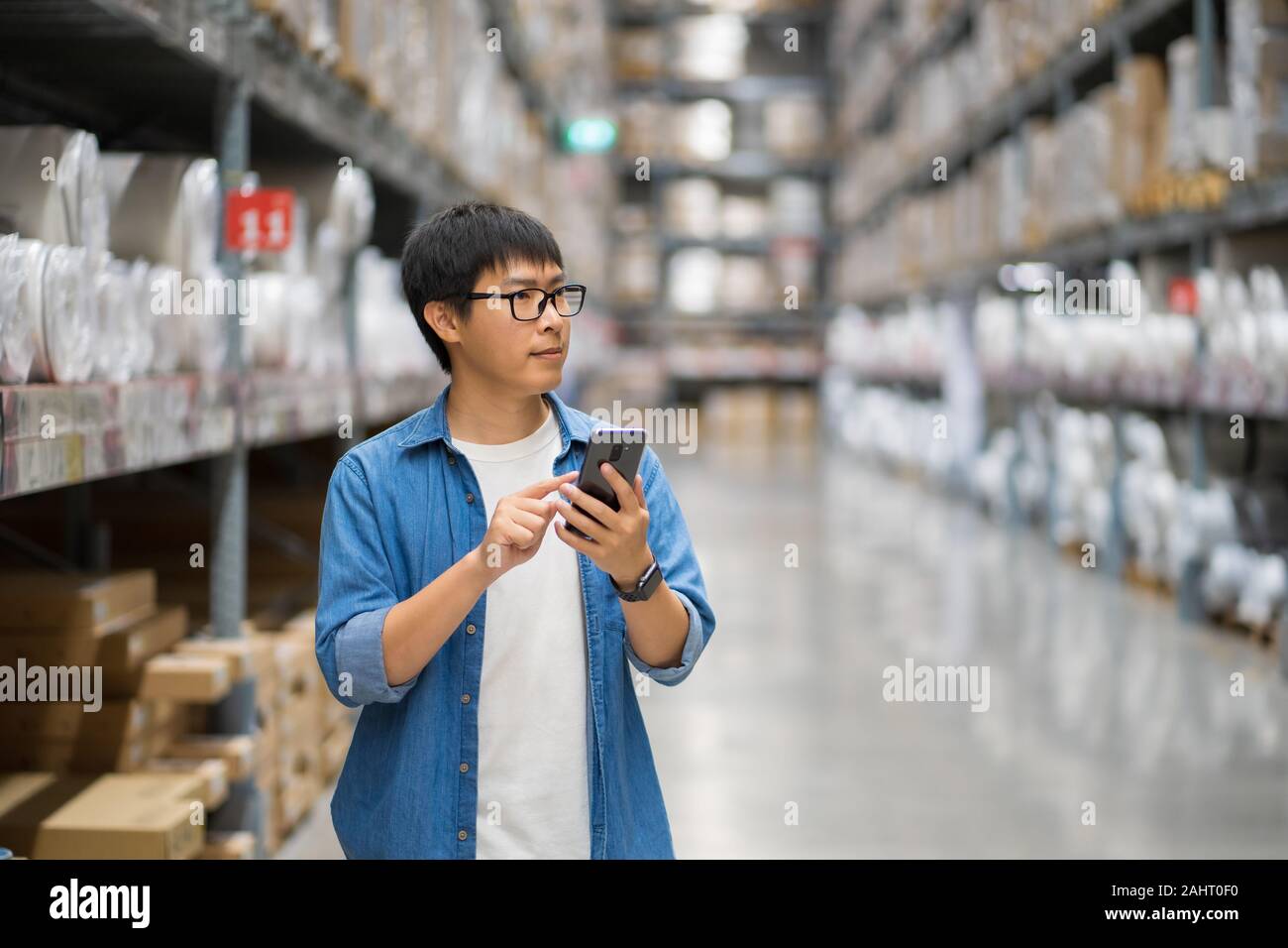 Portrait Asian men, staff, product counting Warehouse Control Manager ...