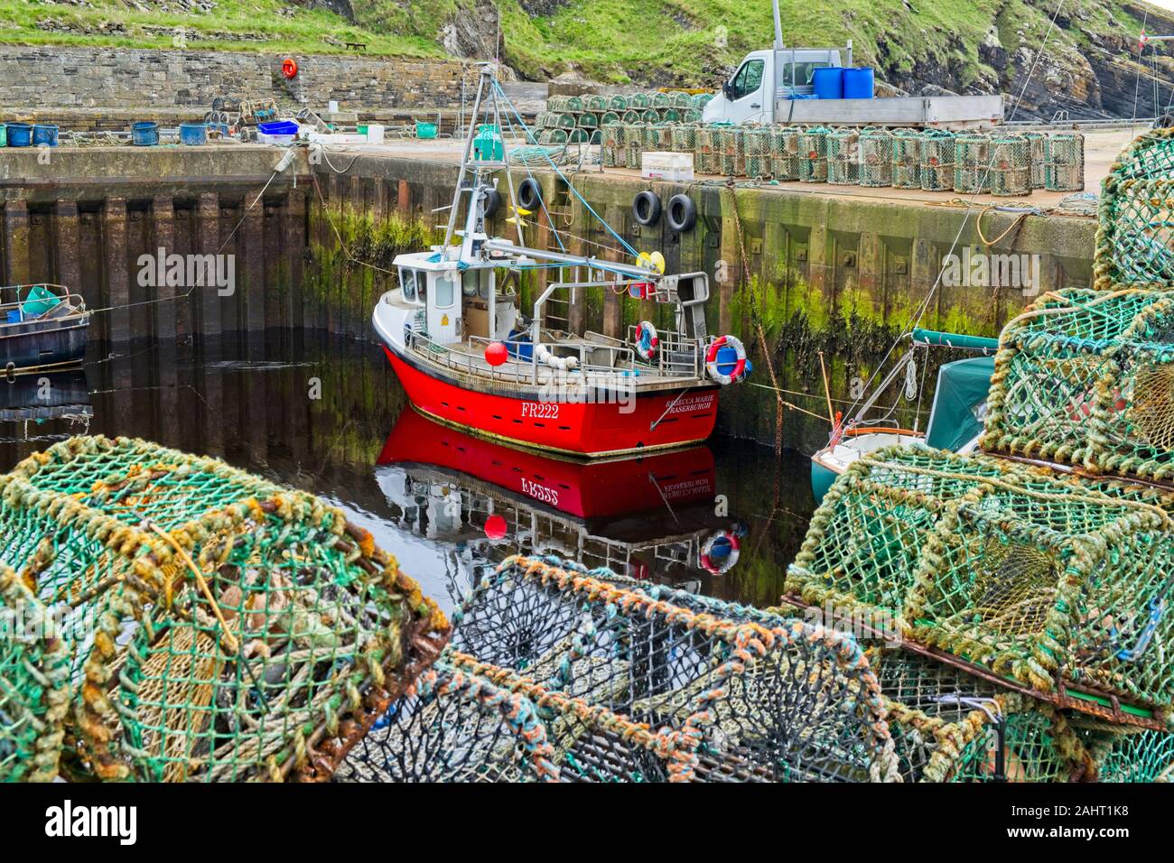 Red fishing boat hi-res stock photography and images - Alamy