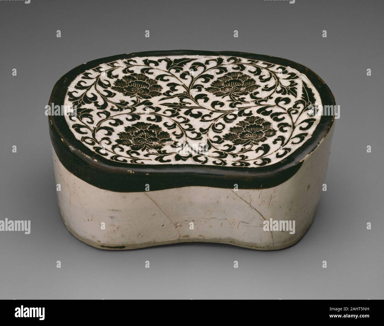Bean-Shaped Pillow with Peony Scrolls. 1100–1127. China. Cizhou ware ...