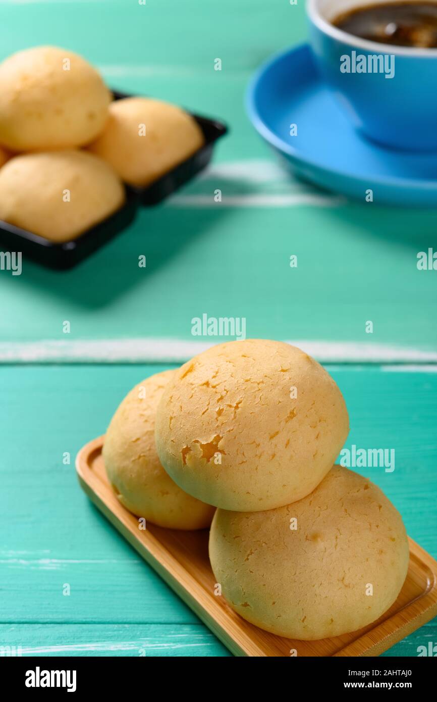 side view sweet puffs and cup of coffee Stock Photo - Alamy