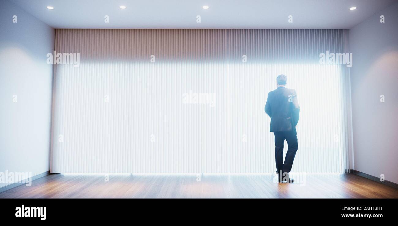 Business man standing in front of office window Stock Photo - Alamy