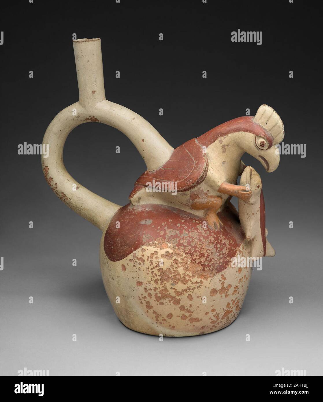 Moche. Handle Spout Vessel in Form of a Mythical Grasping a Fish. 100 ...